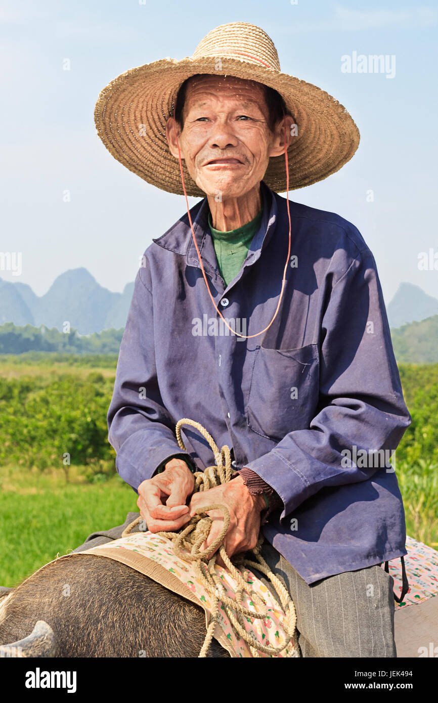 YANGSHUO-CHINA-SEPT. 18, 2006. Characteristic local elderly farmer with ...