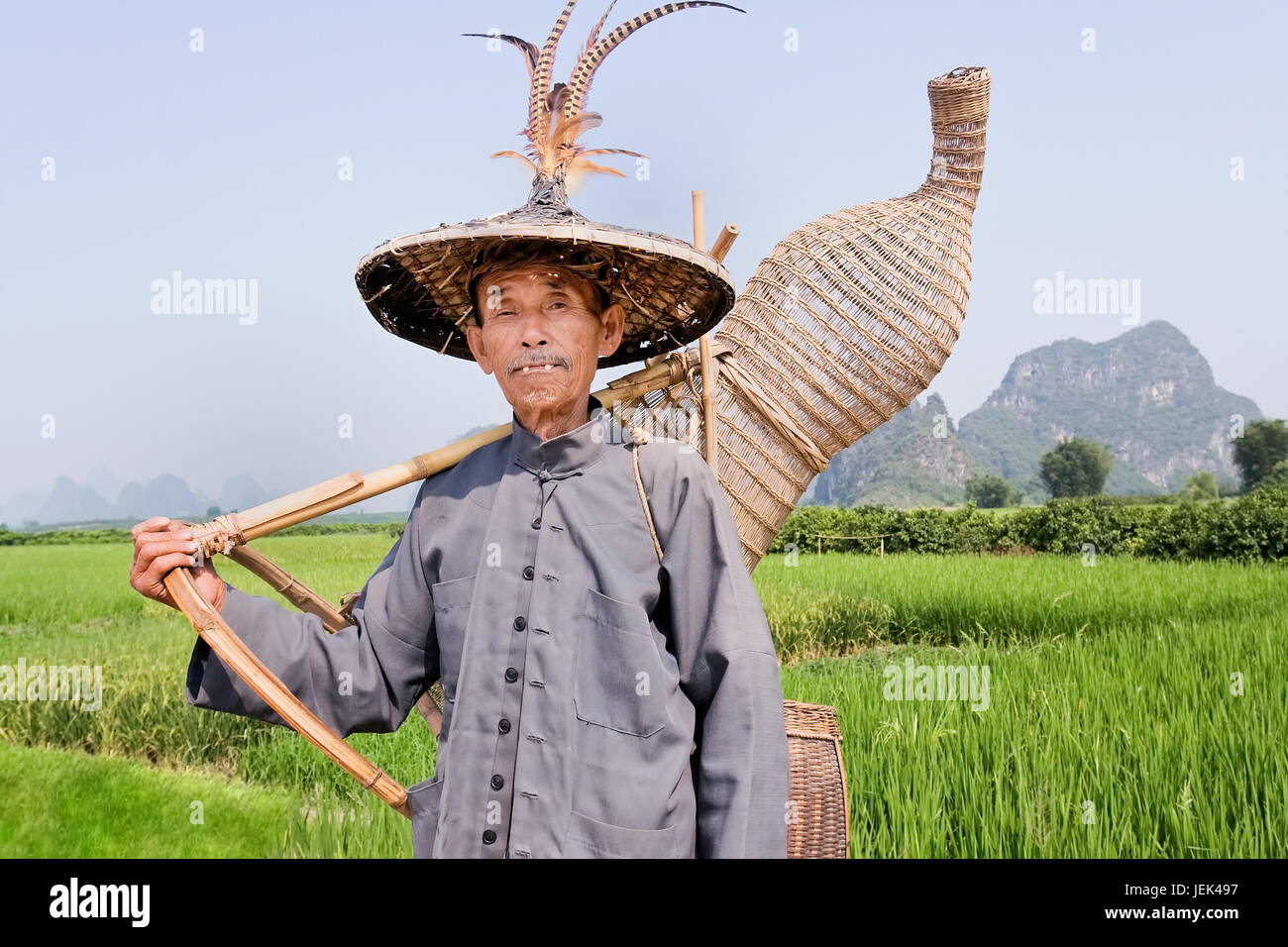 YANGSHUO, CHINA – SEPT. 18, 2006. Old man of Zhuang minority on Sept ...
