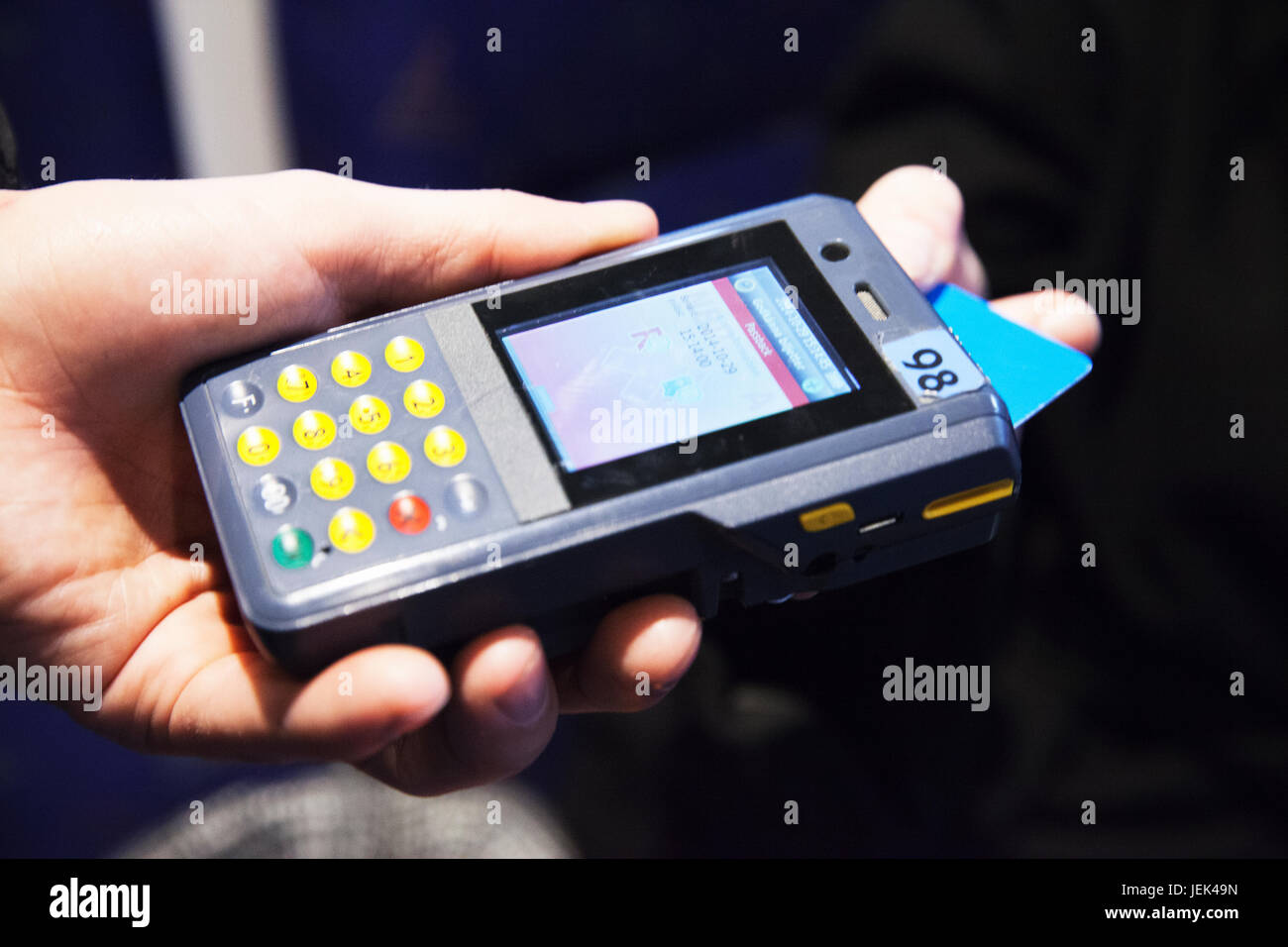 Paying with chip and pin machine Stock Photo - Alamy