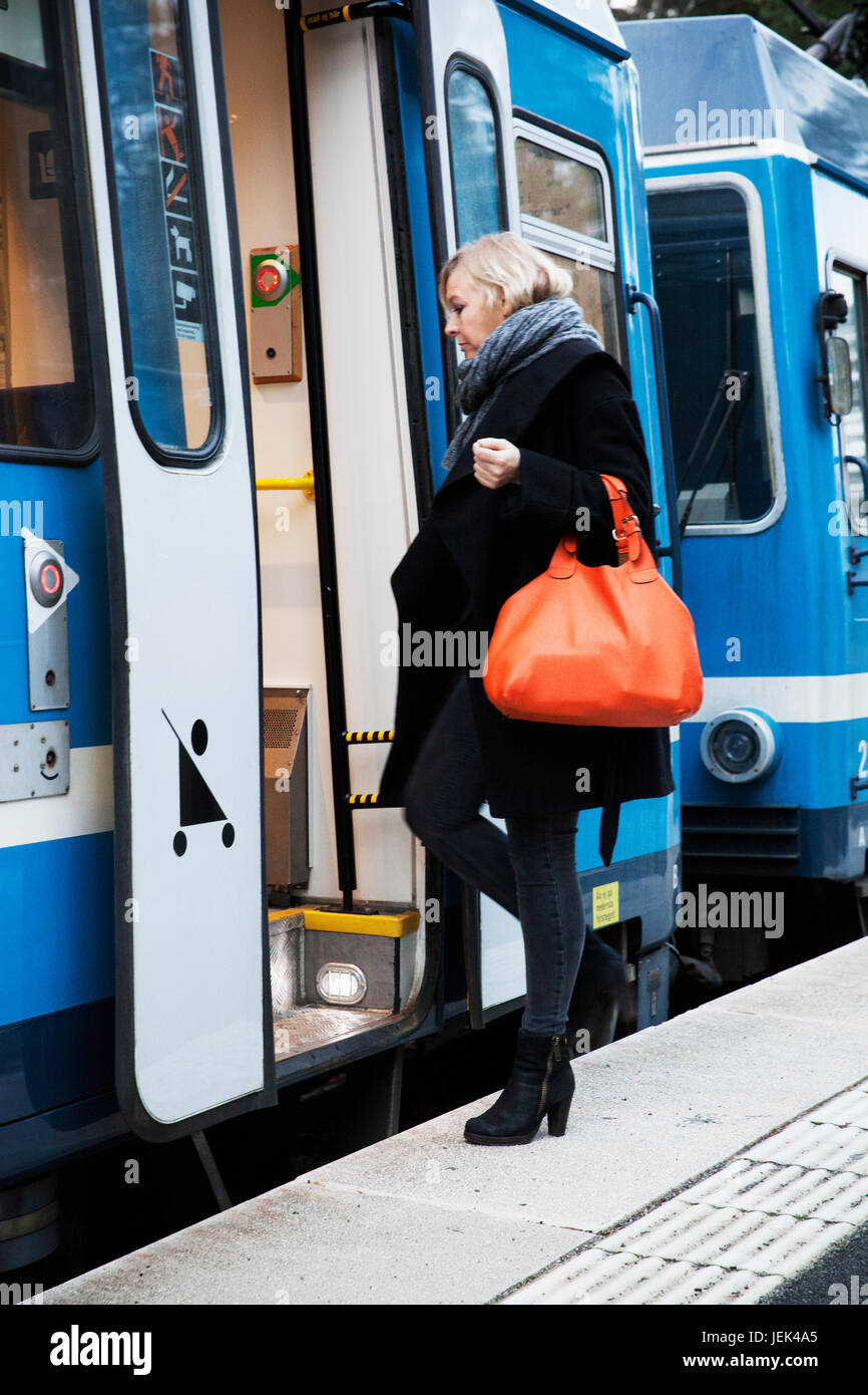 People person entering train hi-res stock photography and images - Alamy