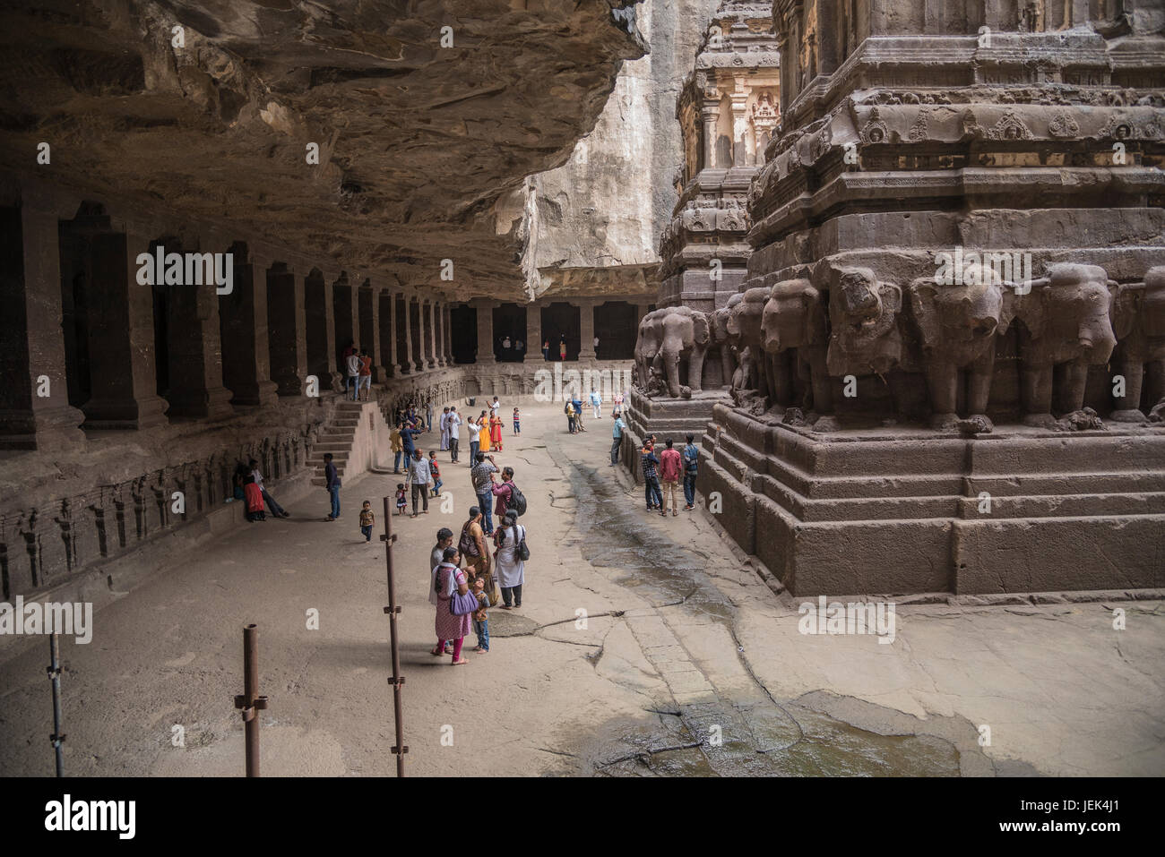 People visiting to the caves in Ellora, Maharashtra state in India ...