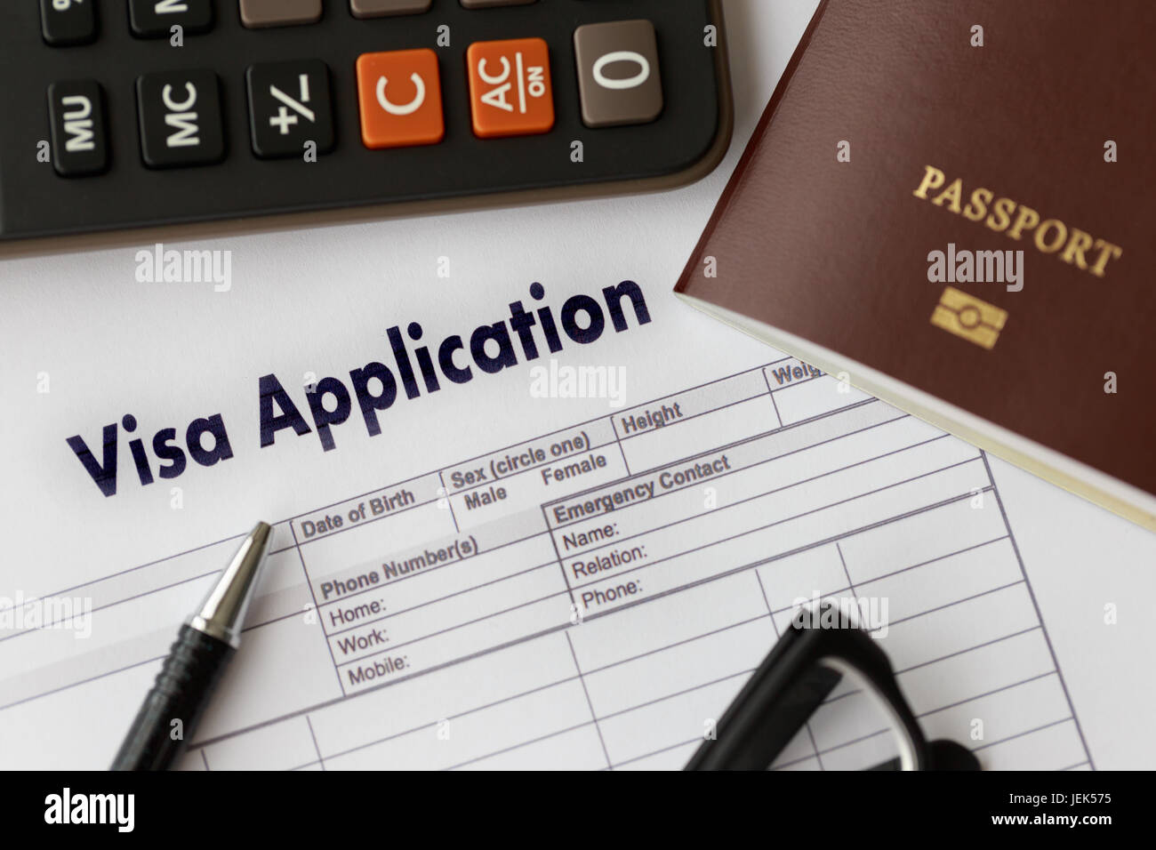 Visa application form to travel Immigration a document Stock Photo - Alamy