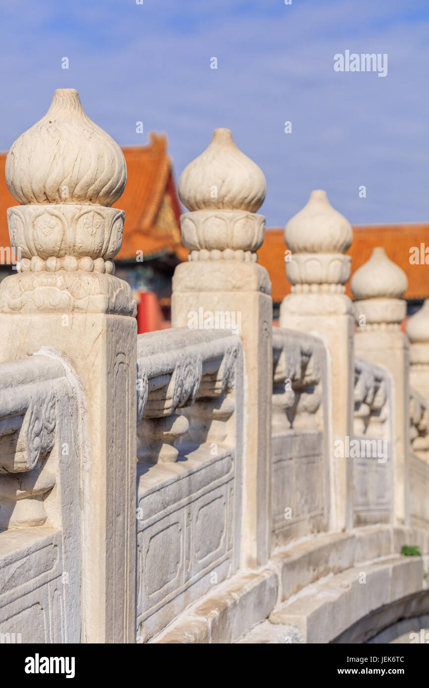 Ornate balustrade with ancient traditional building on background ...