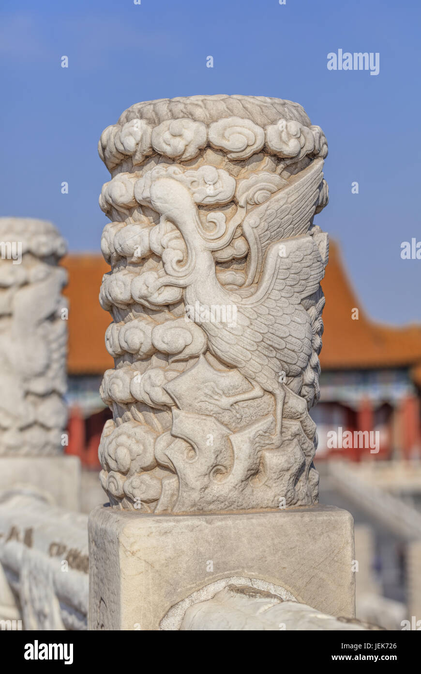 Ornate balustrade with ancient traditional building on background ...