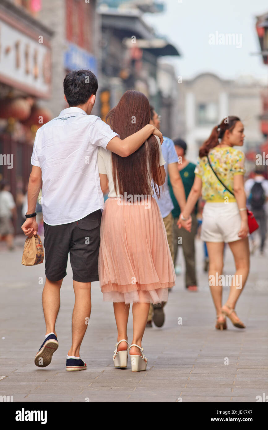 Arm Around Shoulder Couple Walking