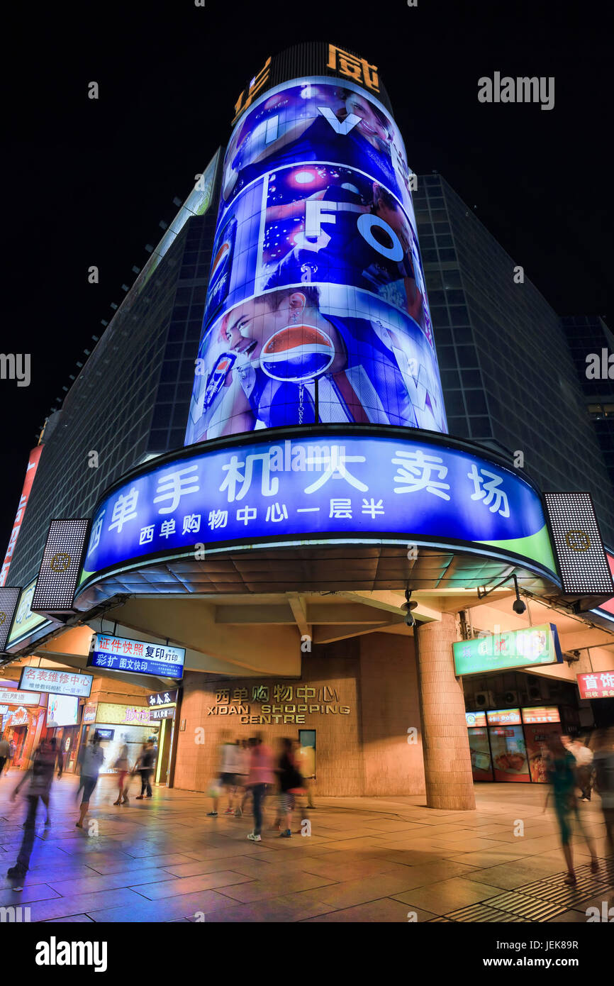 BEIJING-APRIL 24. Xidan Shopping Center at night. The 3,4 miles long ...