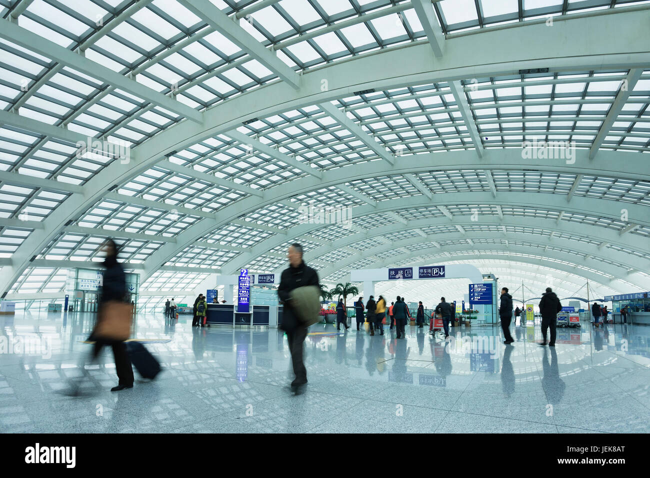 BEIJING-FEBR. 21. Passengers at railway station, Beijing Capital ...