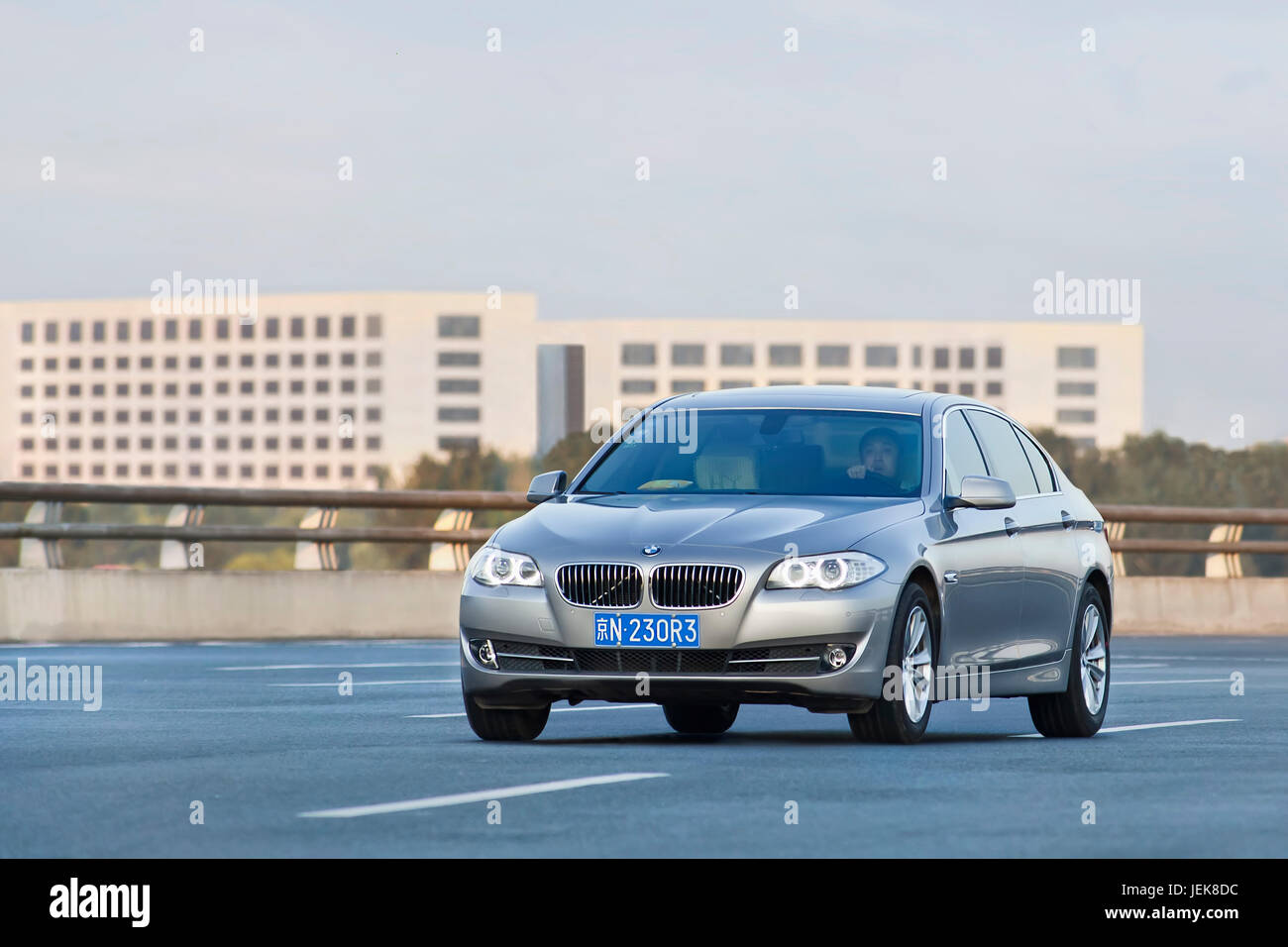 BEIJING-JULY 5. BMW 5 series long wheelbase riding on the expressway at ...