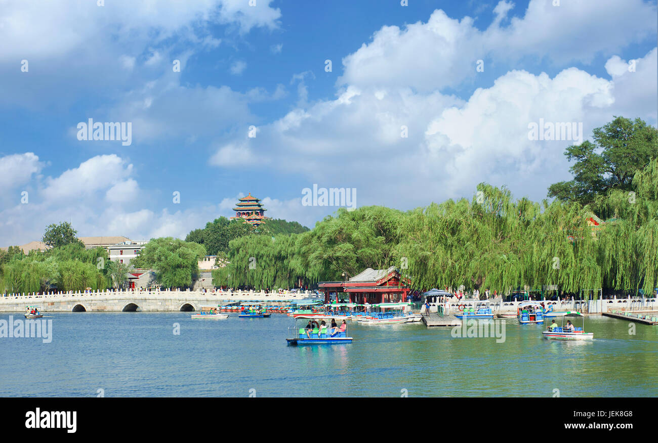 Beijing Beihai Lake with pagoda and stone bridge on background Stock ...