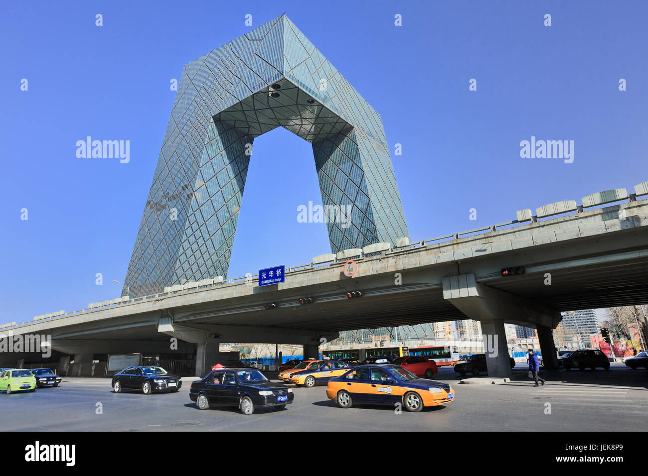 BEIJING – FEB. 08, 2012. CCTV Headquarters with traffic. The building ...