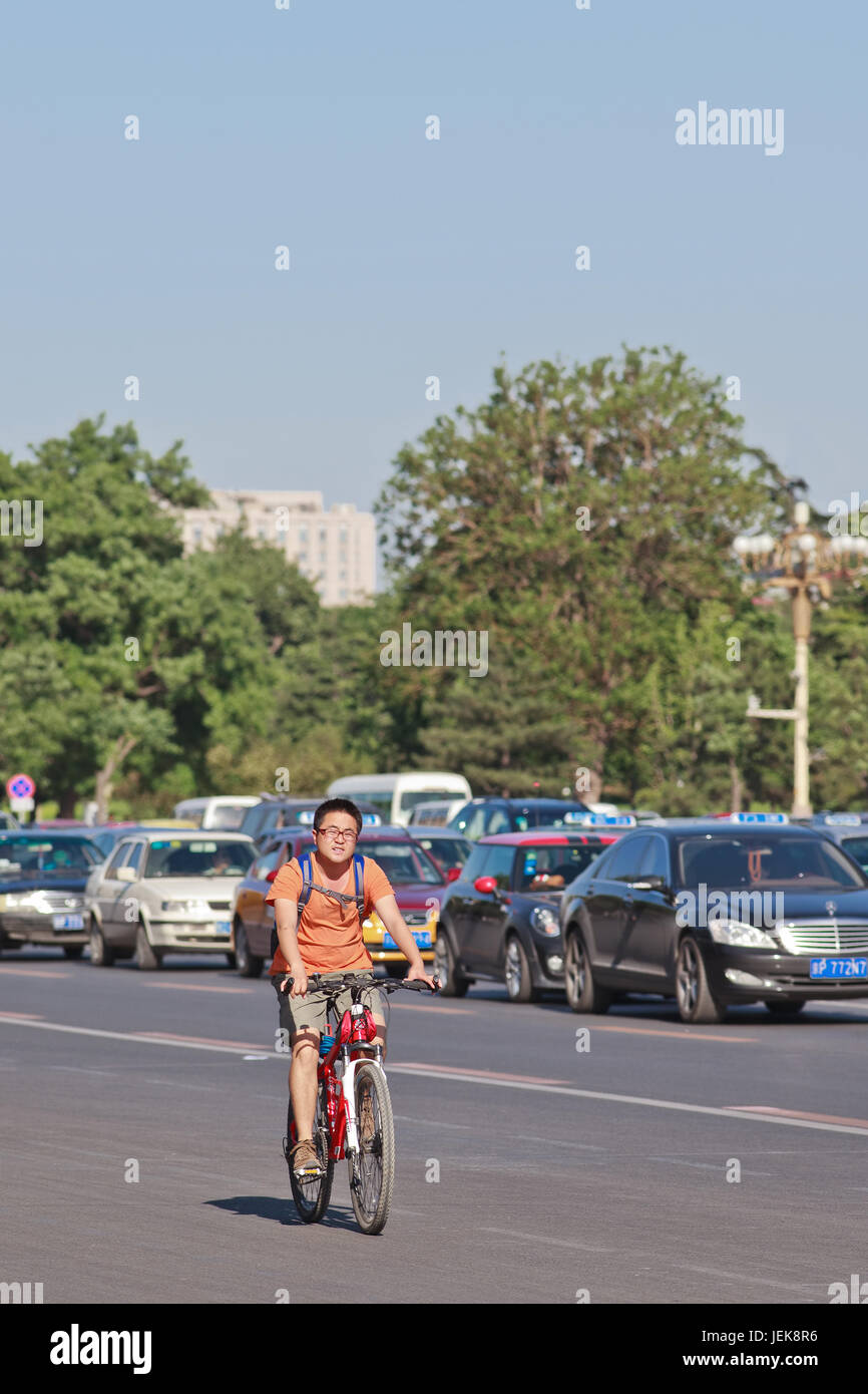 BEIJING-MAY 29, 2013. commuter on an ATB. In Beijing, with over 20 ...