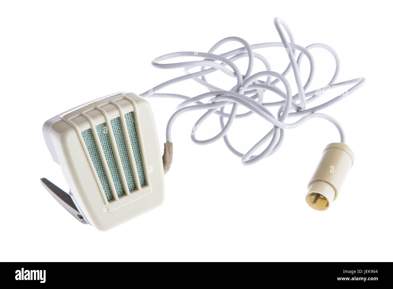 Old plastic retro microphone and cable isolated on white background ...