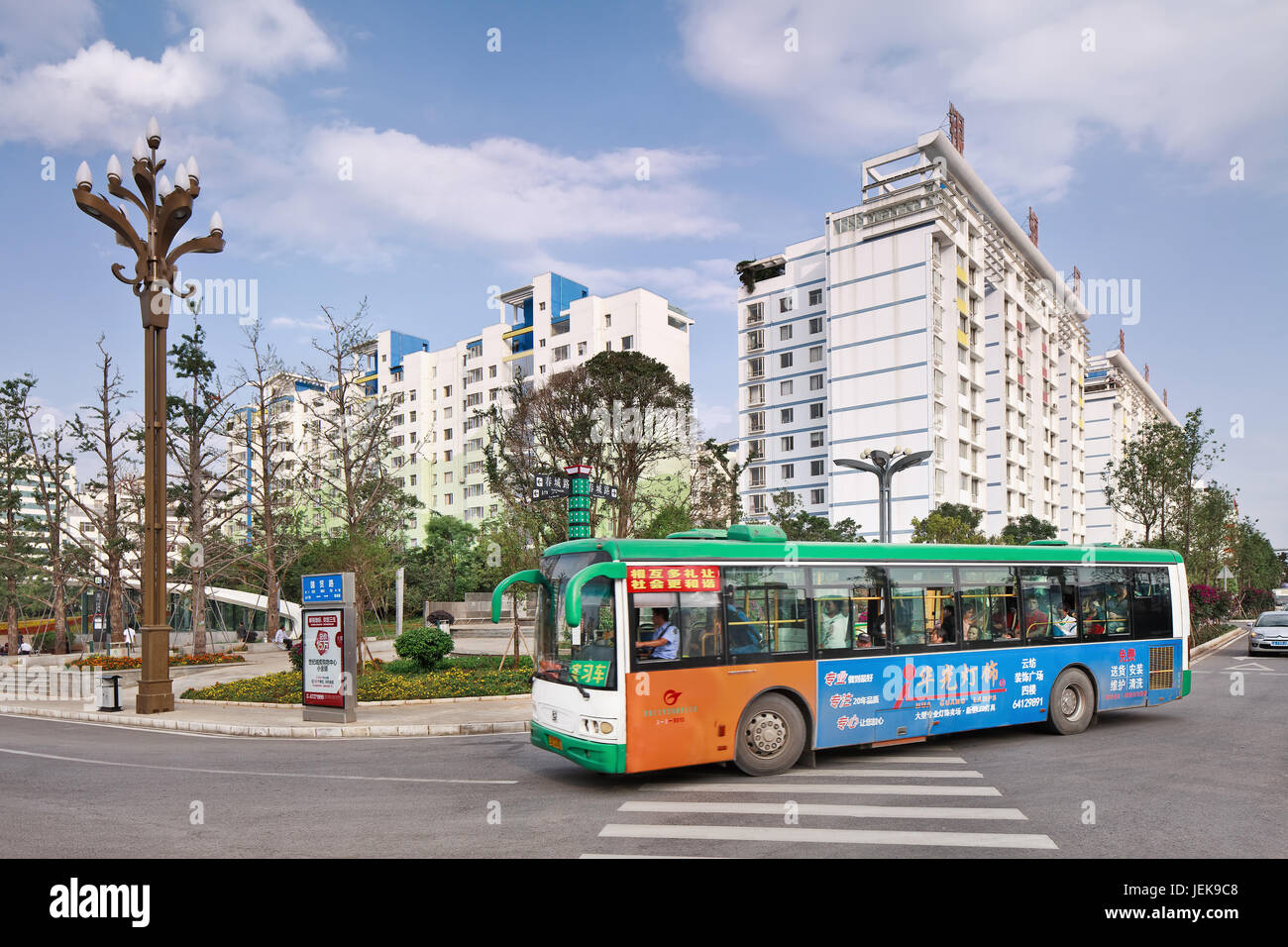 KUNMING-JULY 7, 2014. Bus with advertisement. China’s outdoor ...