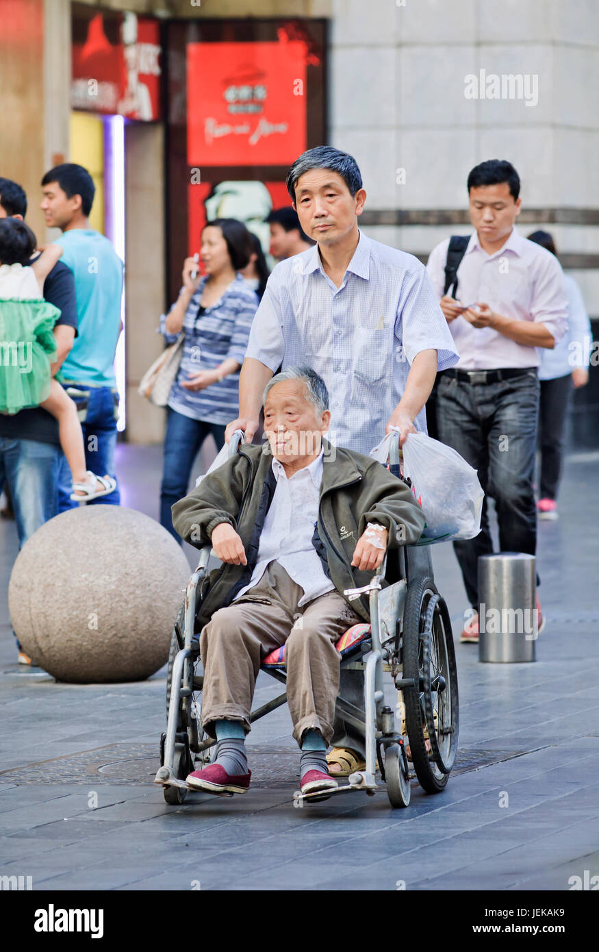 Disabled chinese man hi-res stock photography and images - Alamy