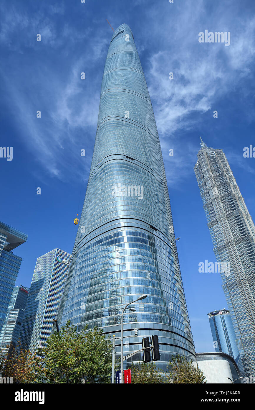 The 632m Shanghai Tower against a blue sky. It is the tallest in China ...
