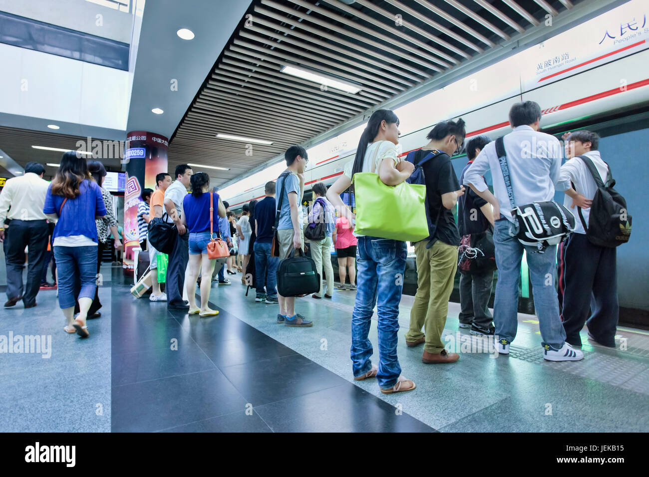 Commuters at subway station. 12 metro lines and 287 stations, with a ...