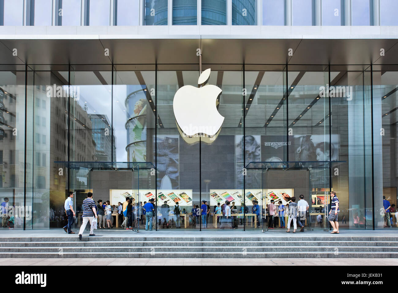 Apple stores in China are packed with people who often line up to grab ...