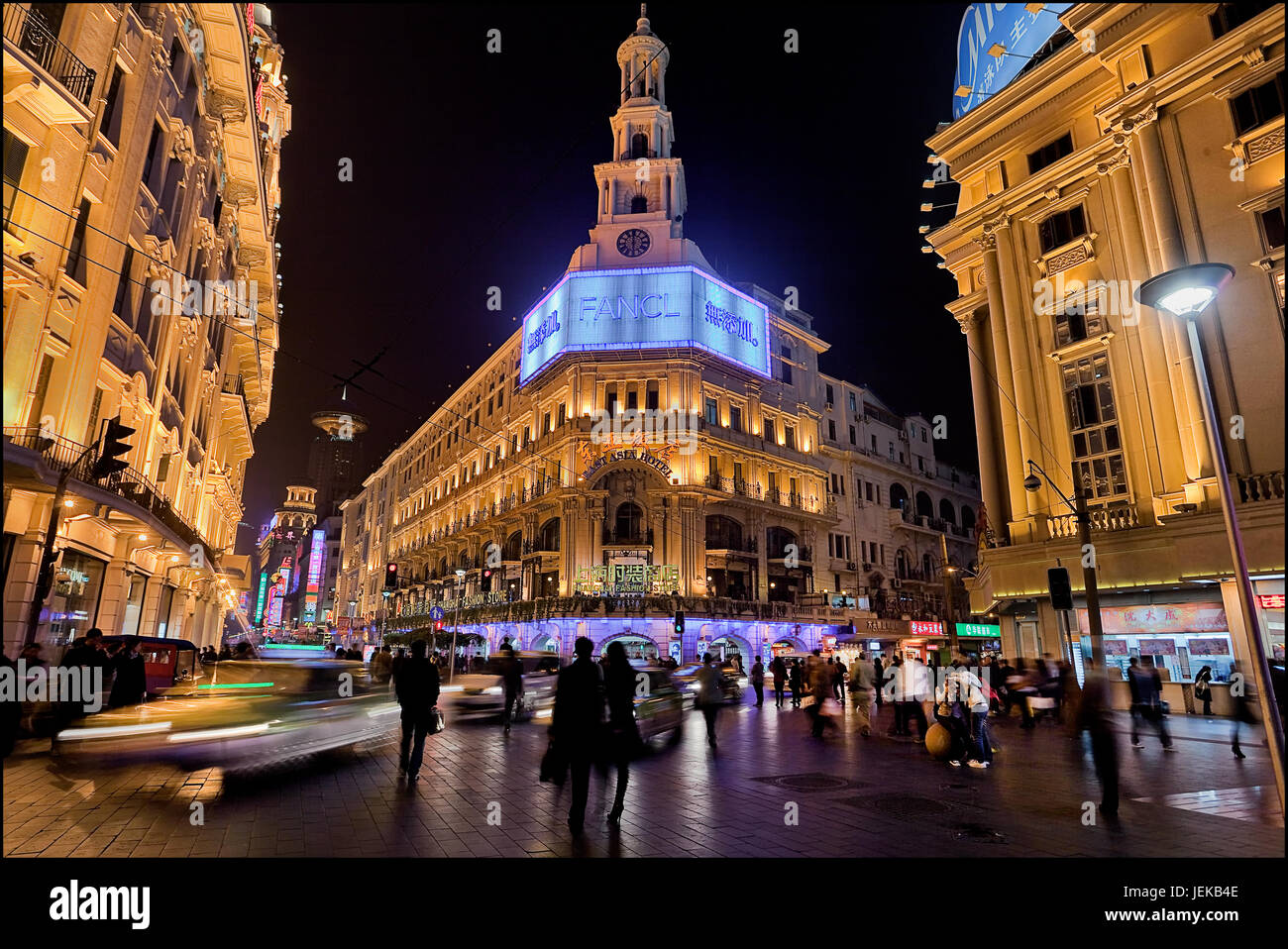 Nanjing East Road at night time. Nanjing Road is the main shopping ...