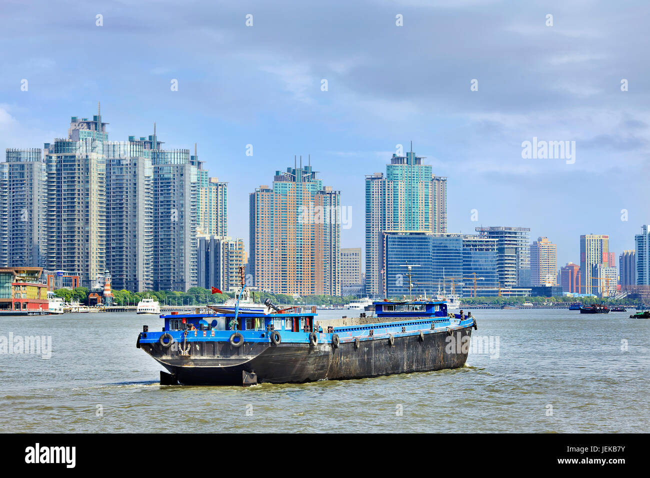 Shipping on Huangpu River. It is largest river in Shanghai, on average ...