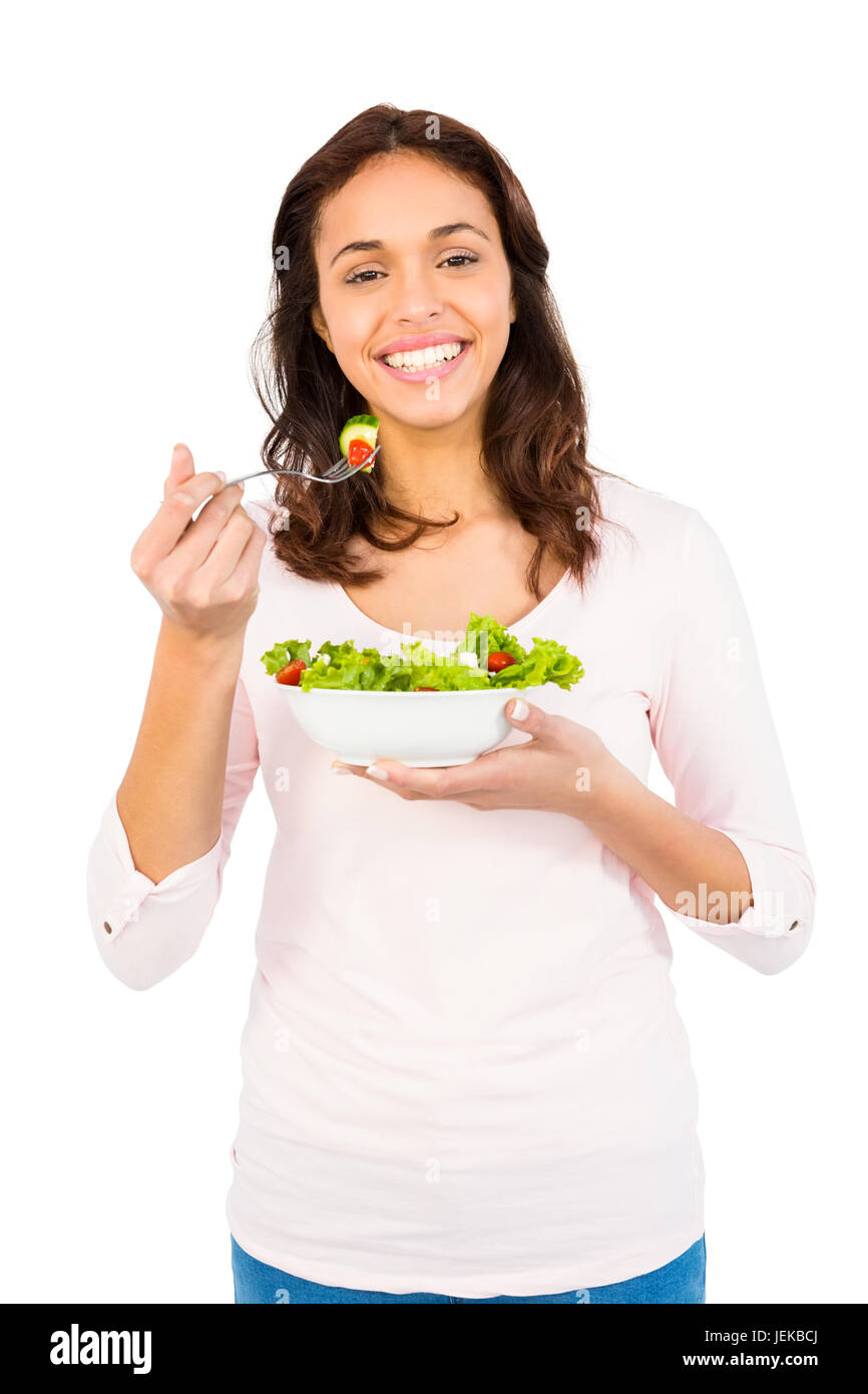 Pretty smiling woman eating salad hi-res stock photography and images - Alamy
