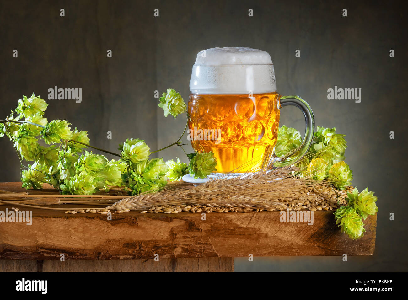 Glass of beer and raw material for beer production Stock Photo - Alamy