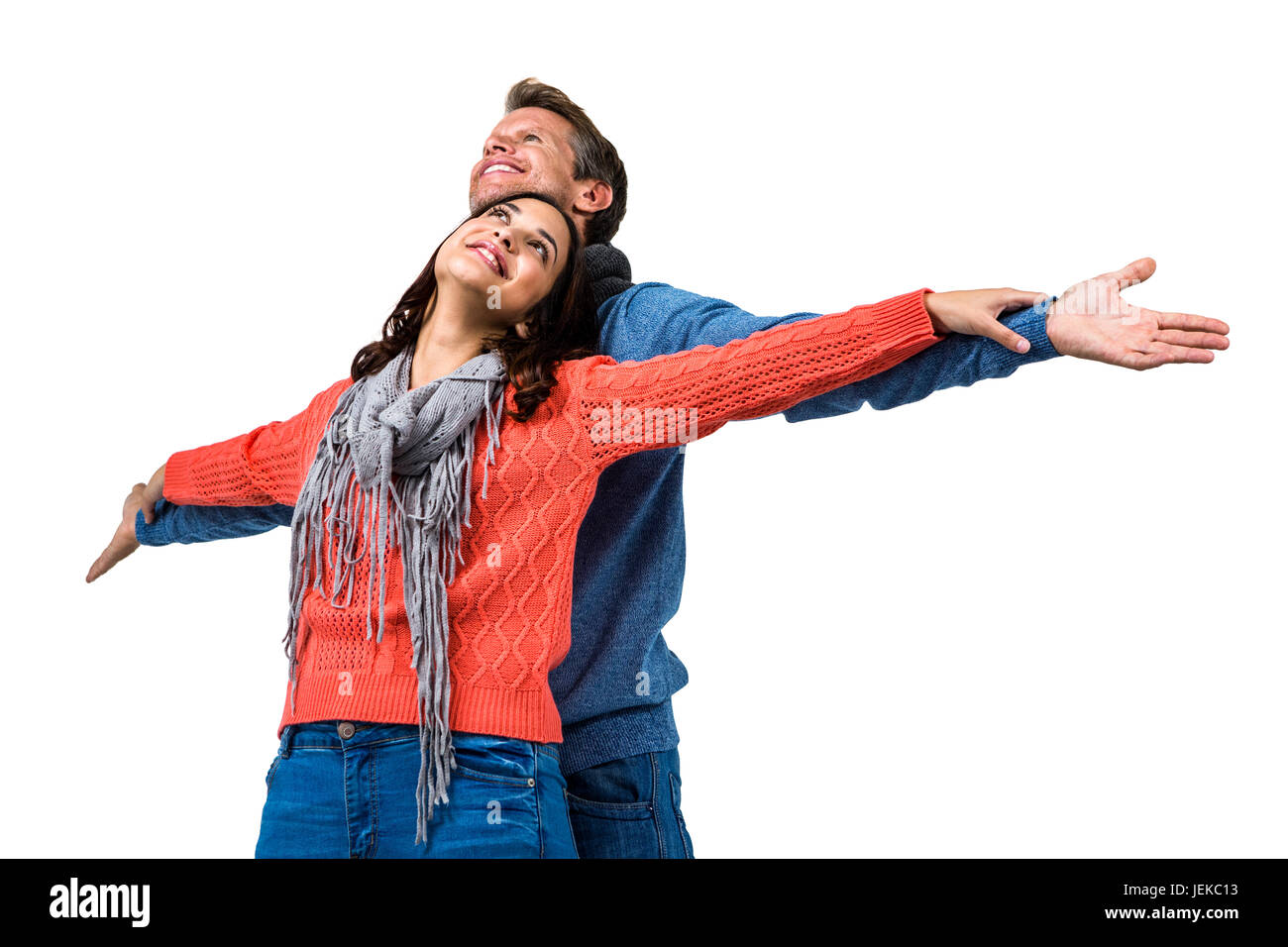 Couple with arms outstretched Stock Photo - Alamy