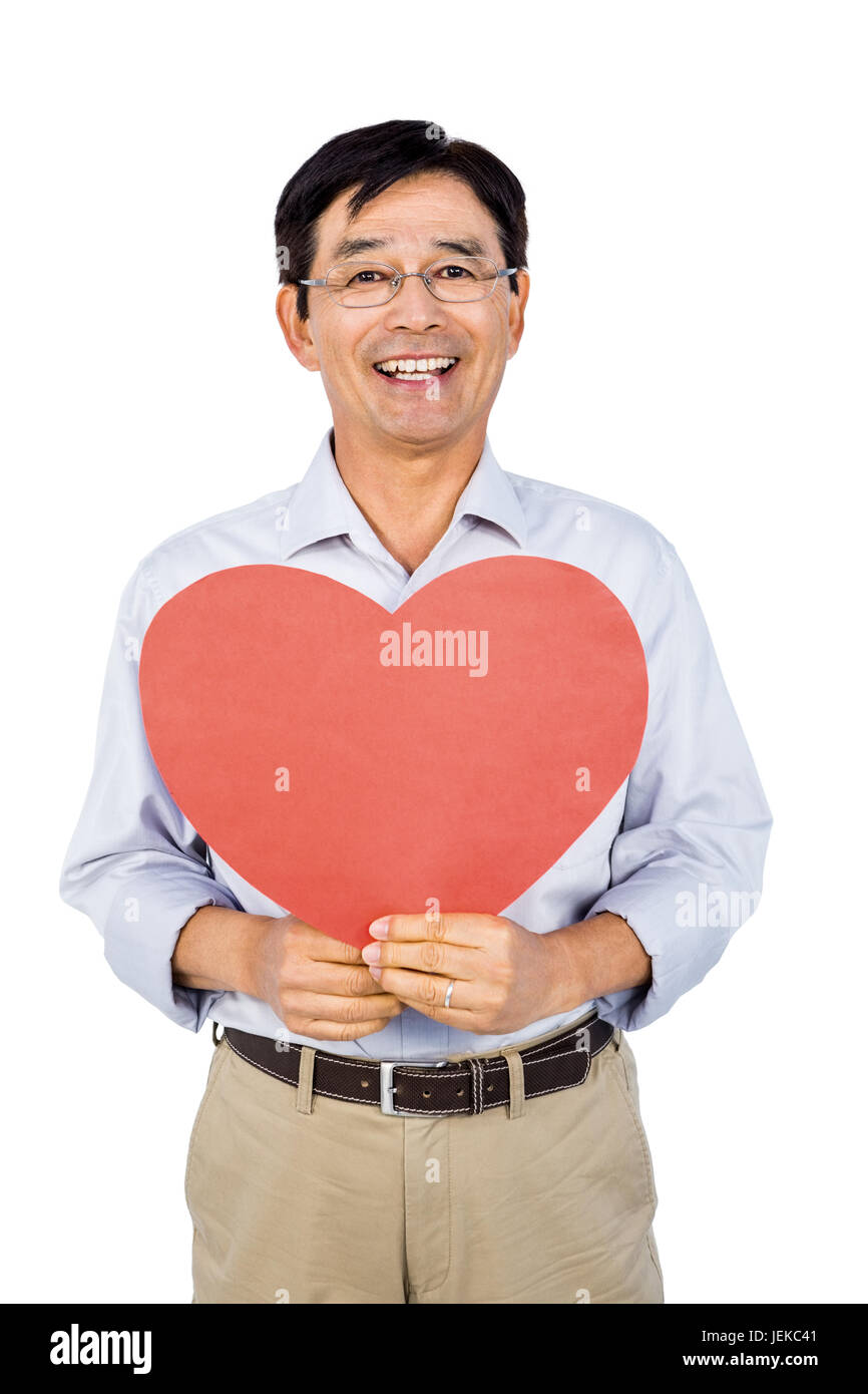 Older asian man showing heart Stock Photo - Alamy