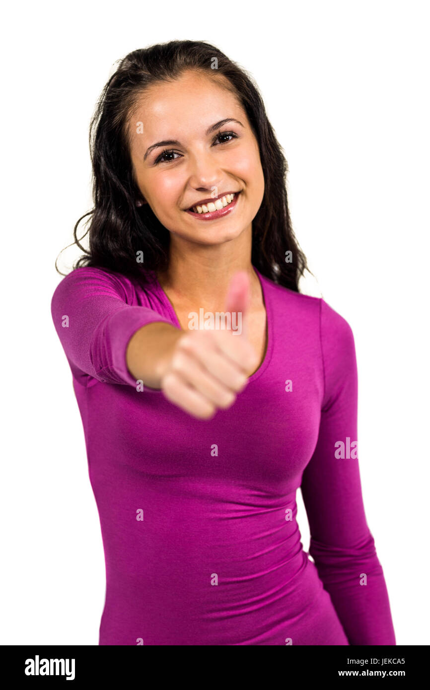 Smiling woman showing thumb up Stock Photo - Alamy
