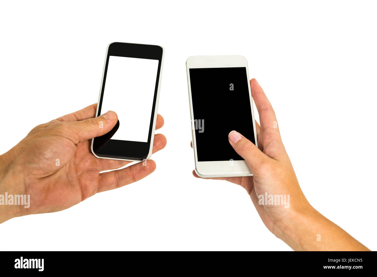 Hands holding smartphones Stock Photo - Alamy