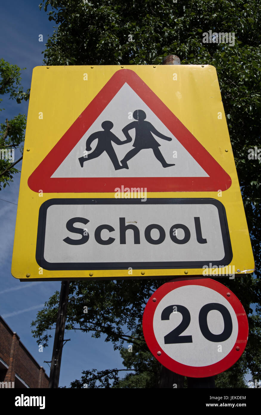 british road signs denoting a school and a 20mph speed limit, in ...