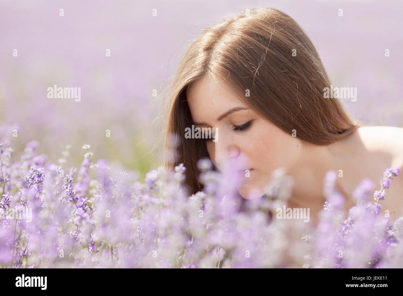Woman smelling lavender hi-res stock photography and images - Alamy