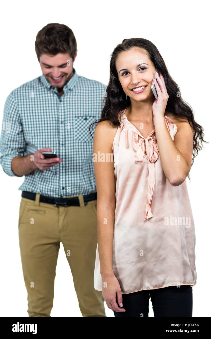 Black couple using smartphones hi-res stock photography and images - Alamy