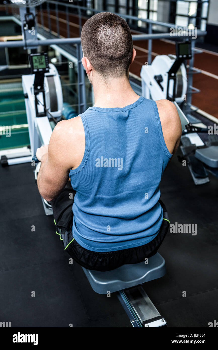 Man using rowing machine hi-res stock photography and images - Alamy