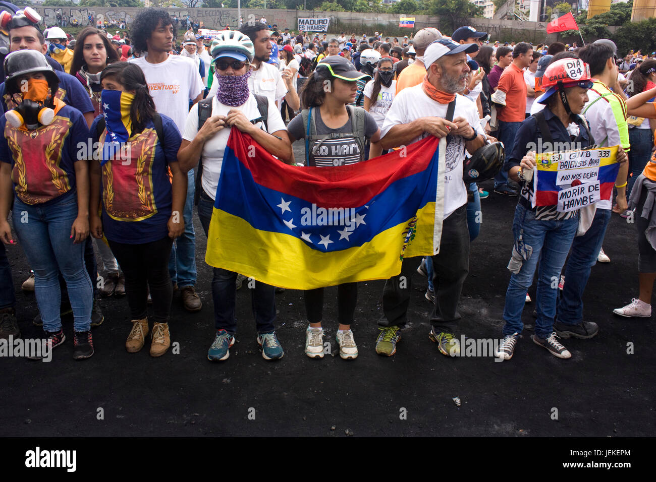 Demonstrators making a human chain outside of a military air base ...
