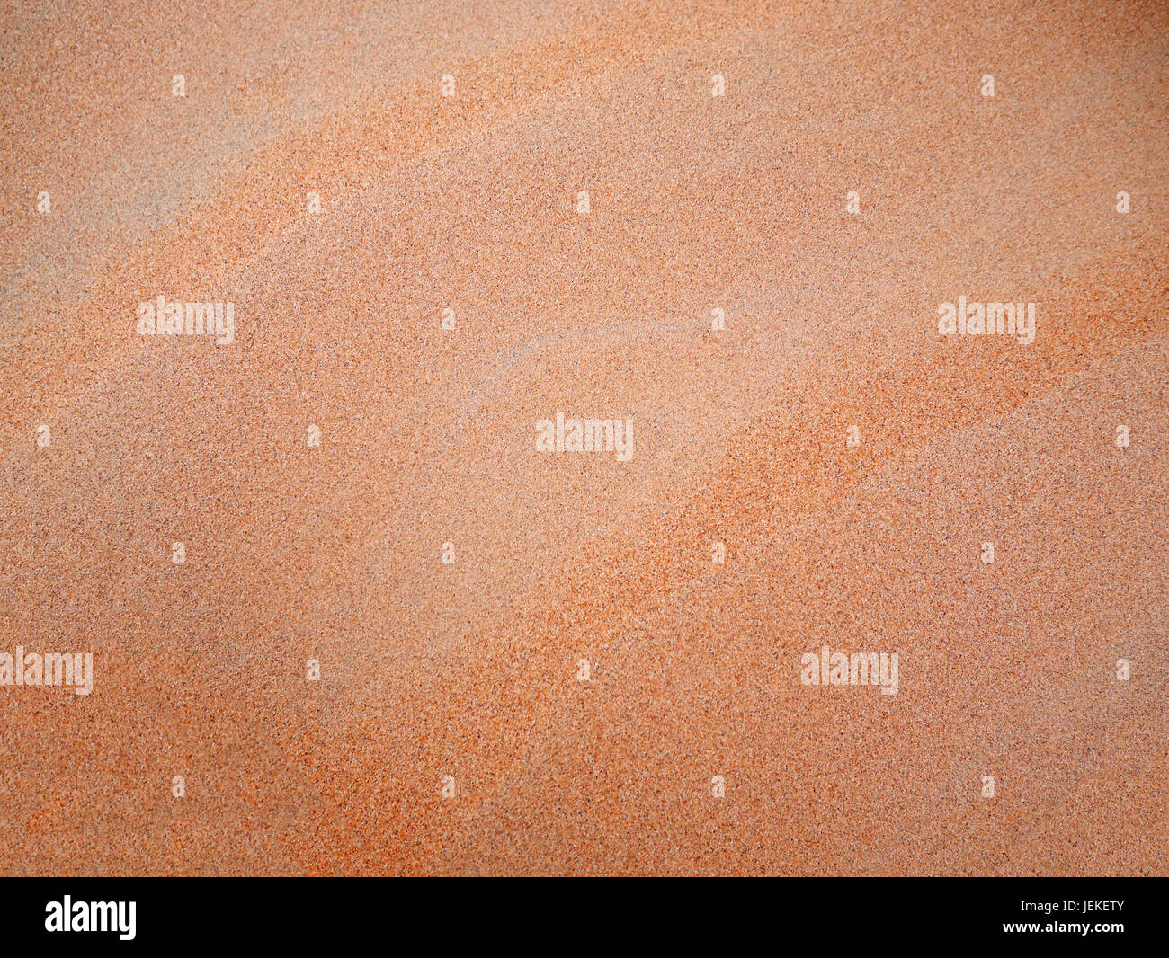 Orange sand texture Stock Photo - Alamy