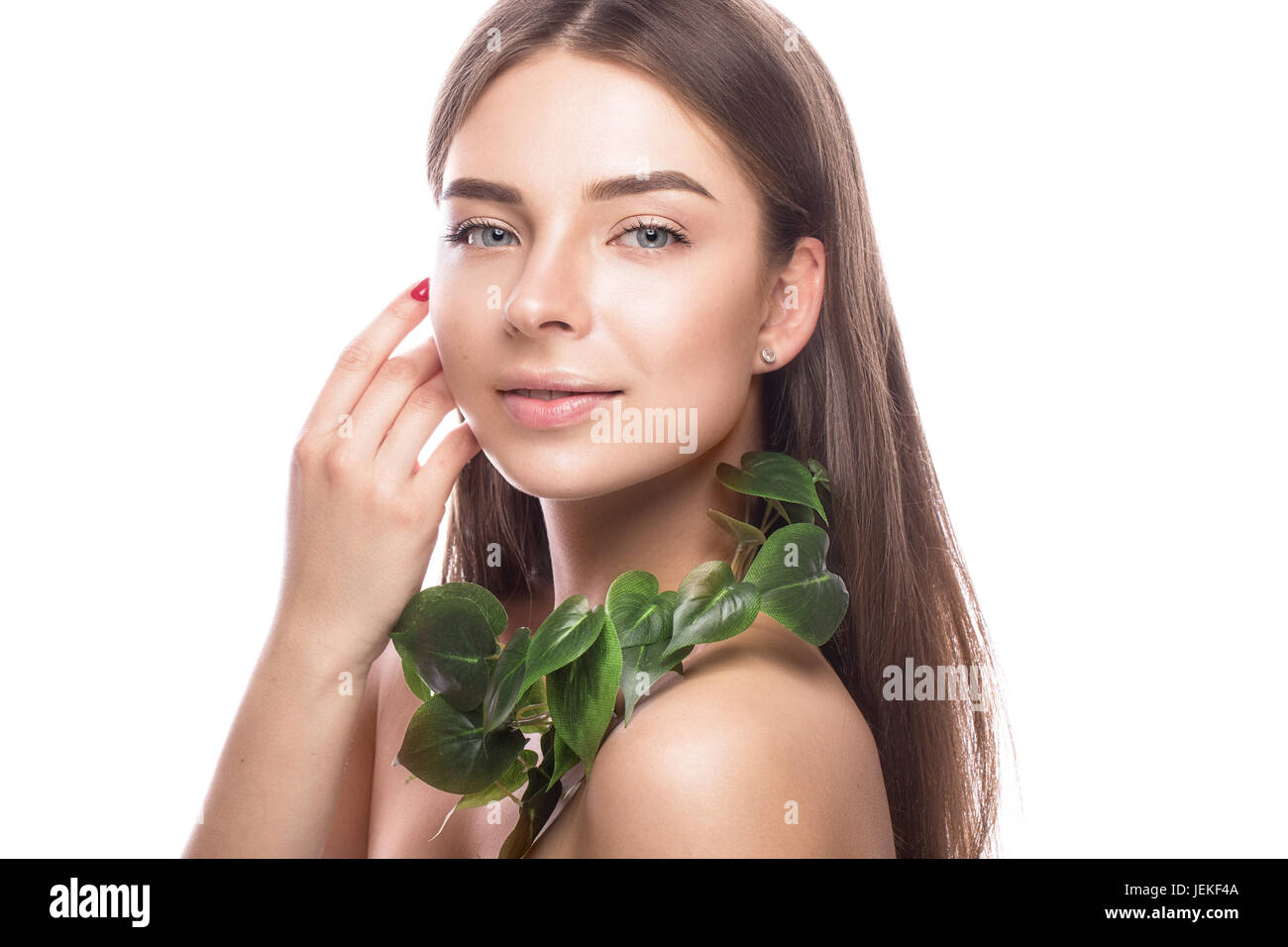 Beautiful young girl with a light natural make-up and perfect skin with ...