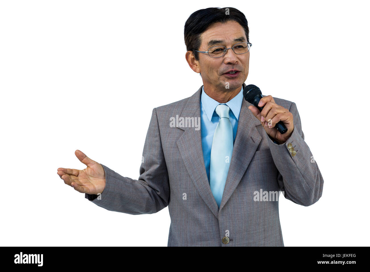 Asian businessman holding microphone Stock Photo - Alamy