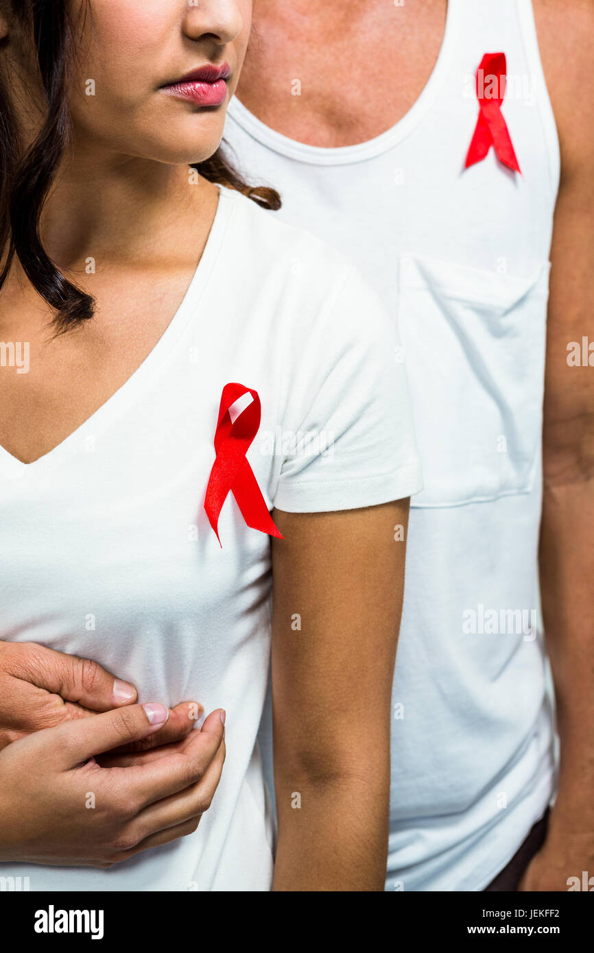 Couple supporting aids awareness together Stock Photo - Alamy