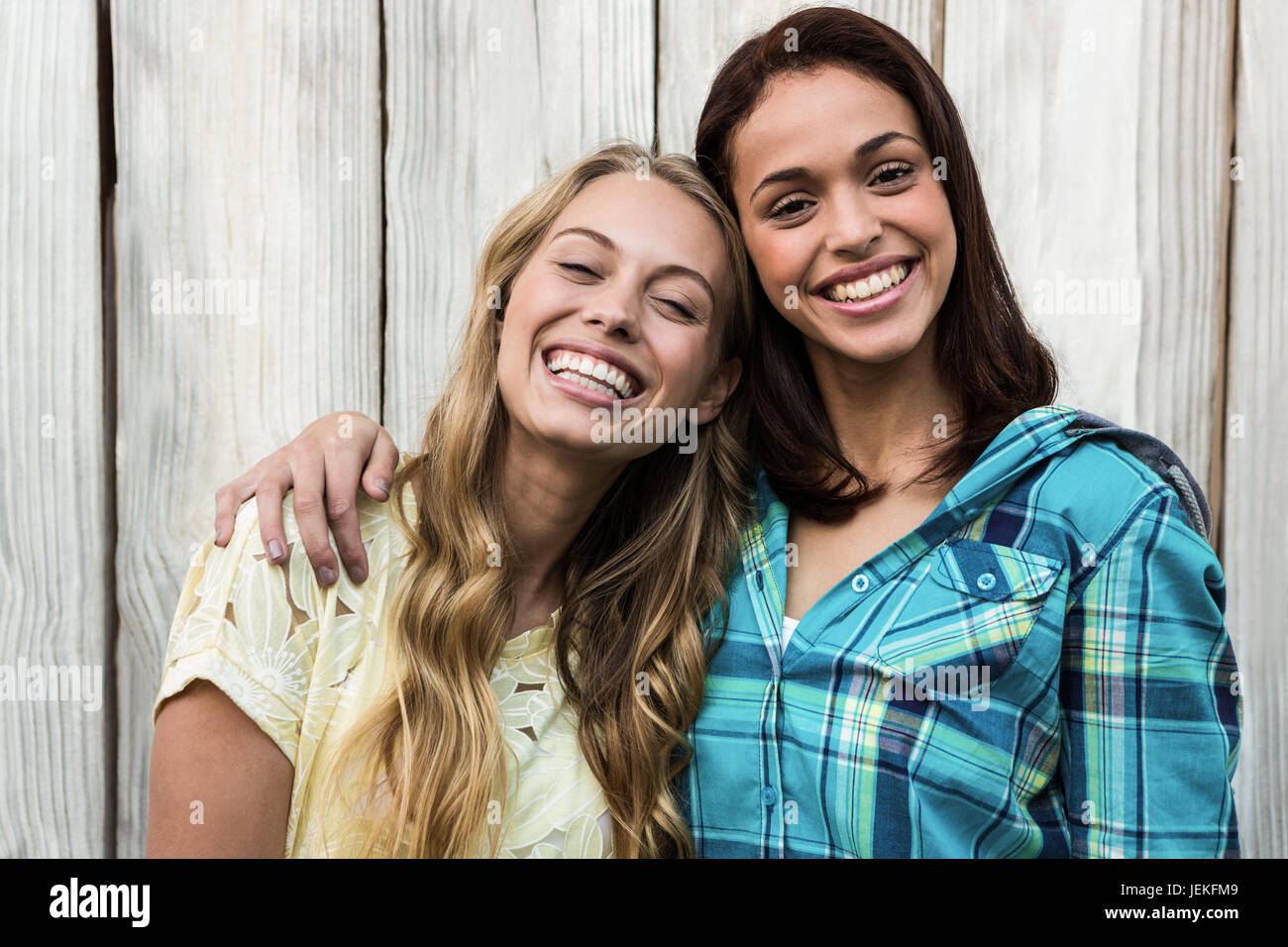 Two friends smiling Stock Photo - Alamy