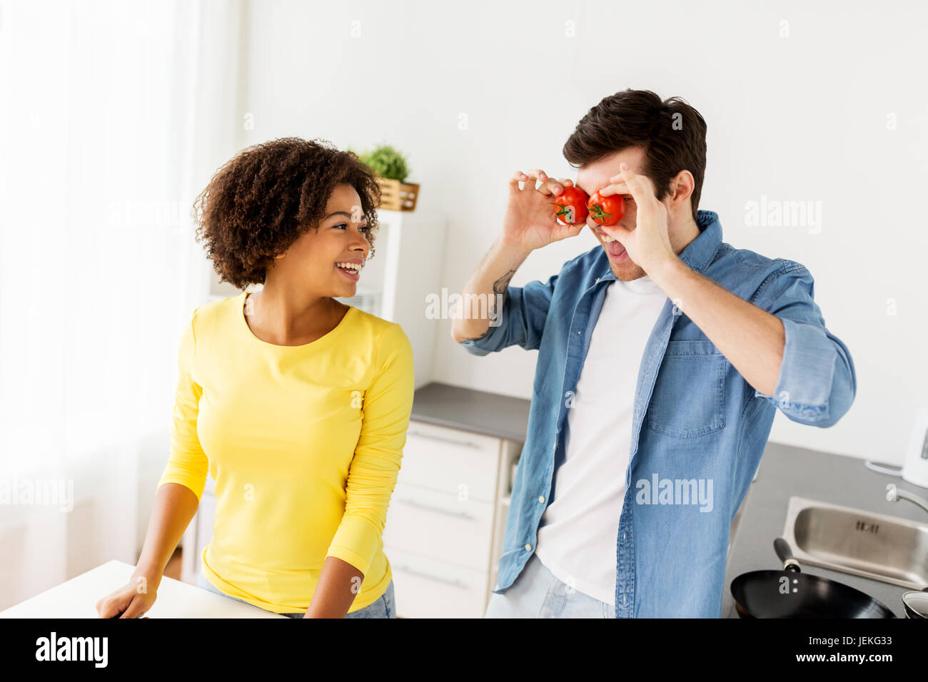 Couple home having fun cooking hi-res stock photography and images - Alamy