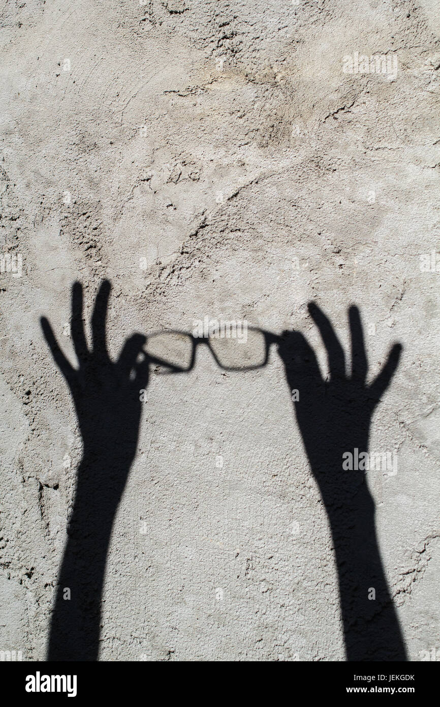 Man holding spectacles hi-res stock photography and images - Alamy