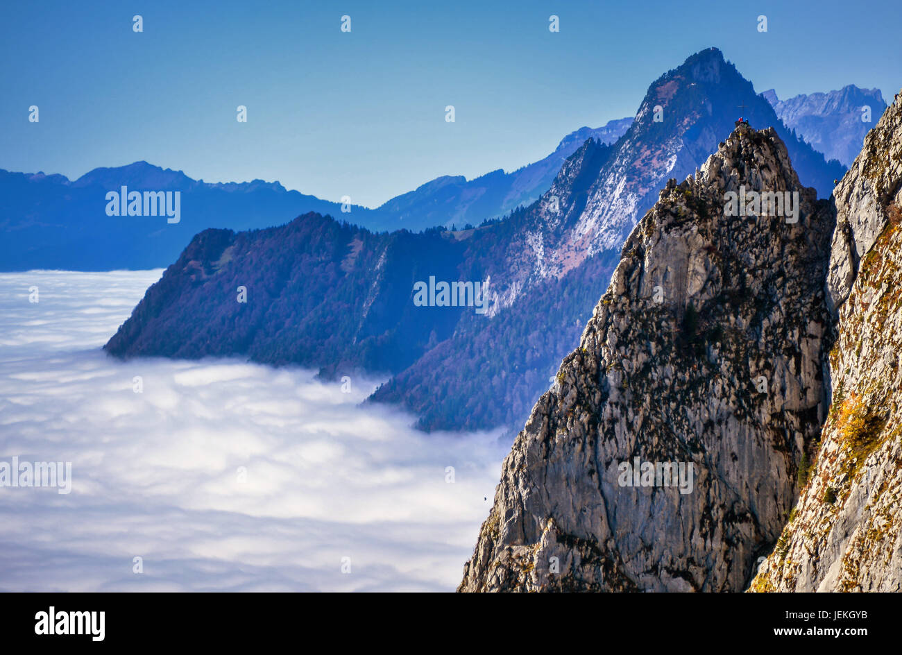 Grosser mythen mountain peaks through the clouds hi-res stock ...