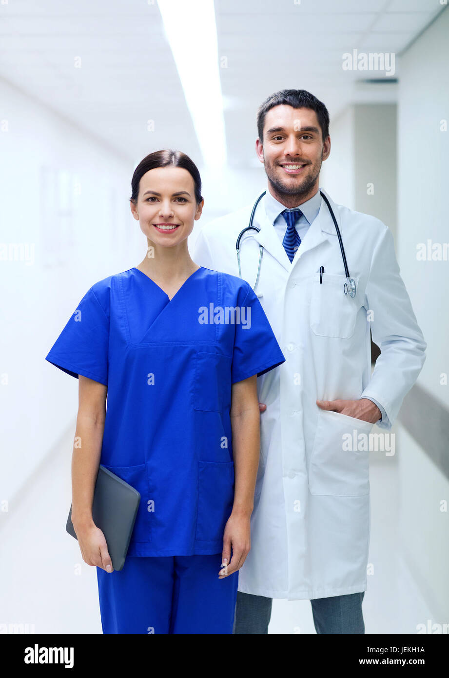 Happy nurse in white hi-res stock photography and images - Alamy