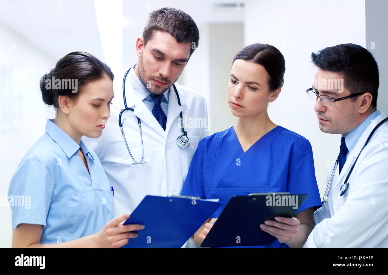 group of medics at hospital with clipboard Stock Photo - Alamy