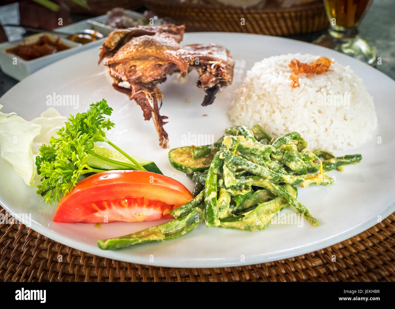 Rice with fried duck and vegetables Stock Photo - Alamy