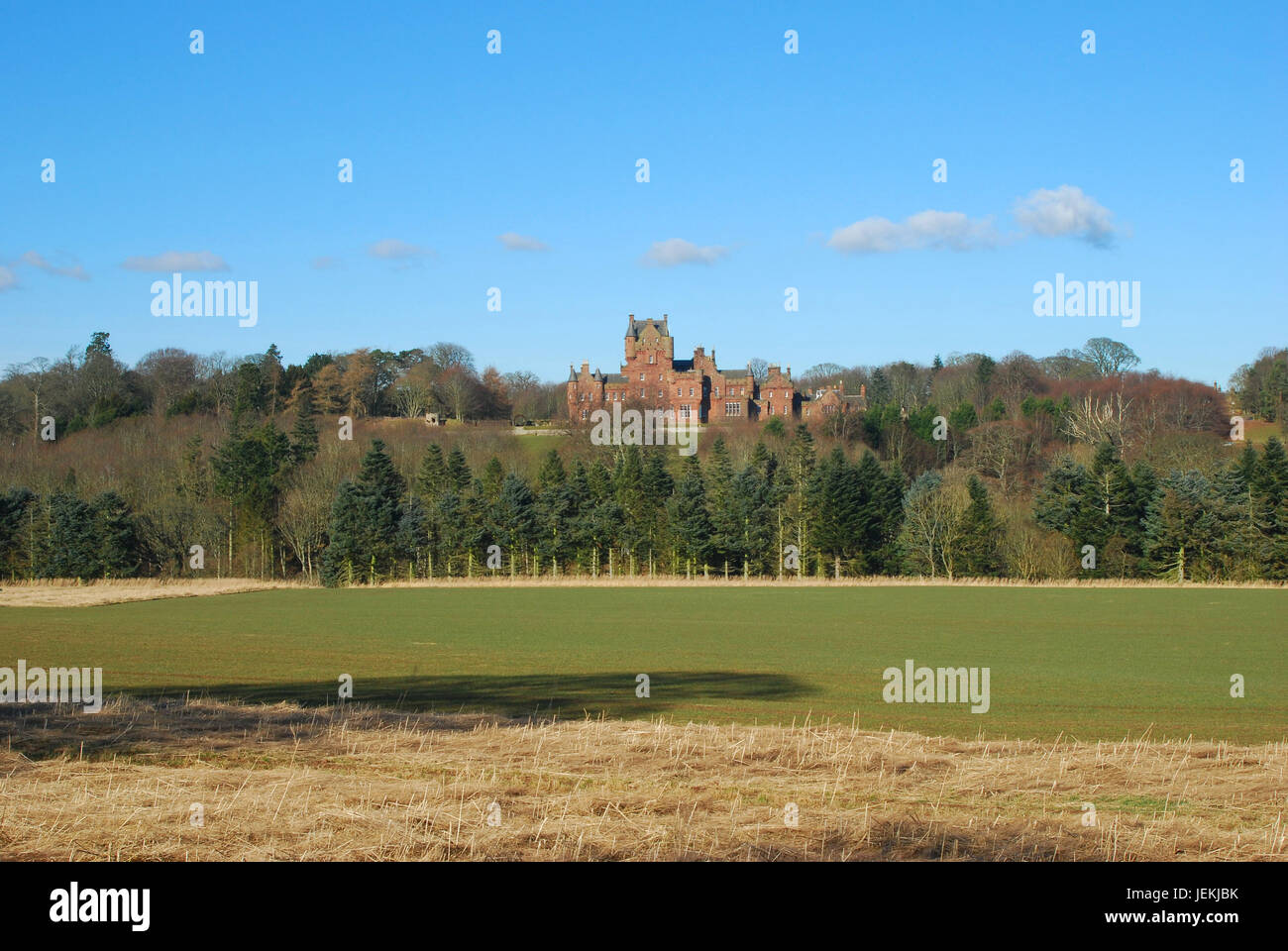 Ayton castle from south over fields and woods in Berwickshire Stock ...