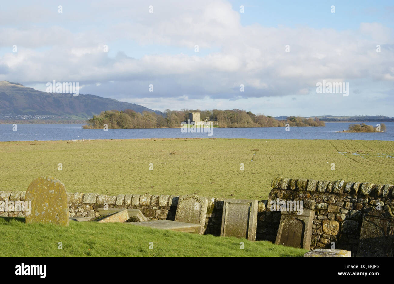 looking over Loch Leven to Leven castle from old graveyard at Kinross ...
