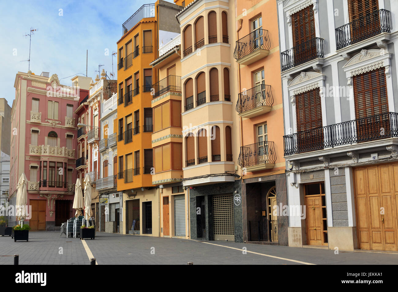 Differing architectural styles of buildings in Onda, Province of ...