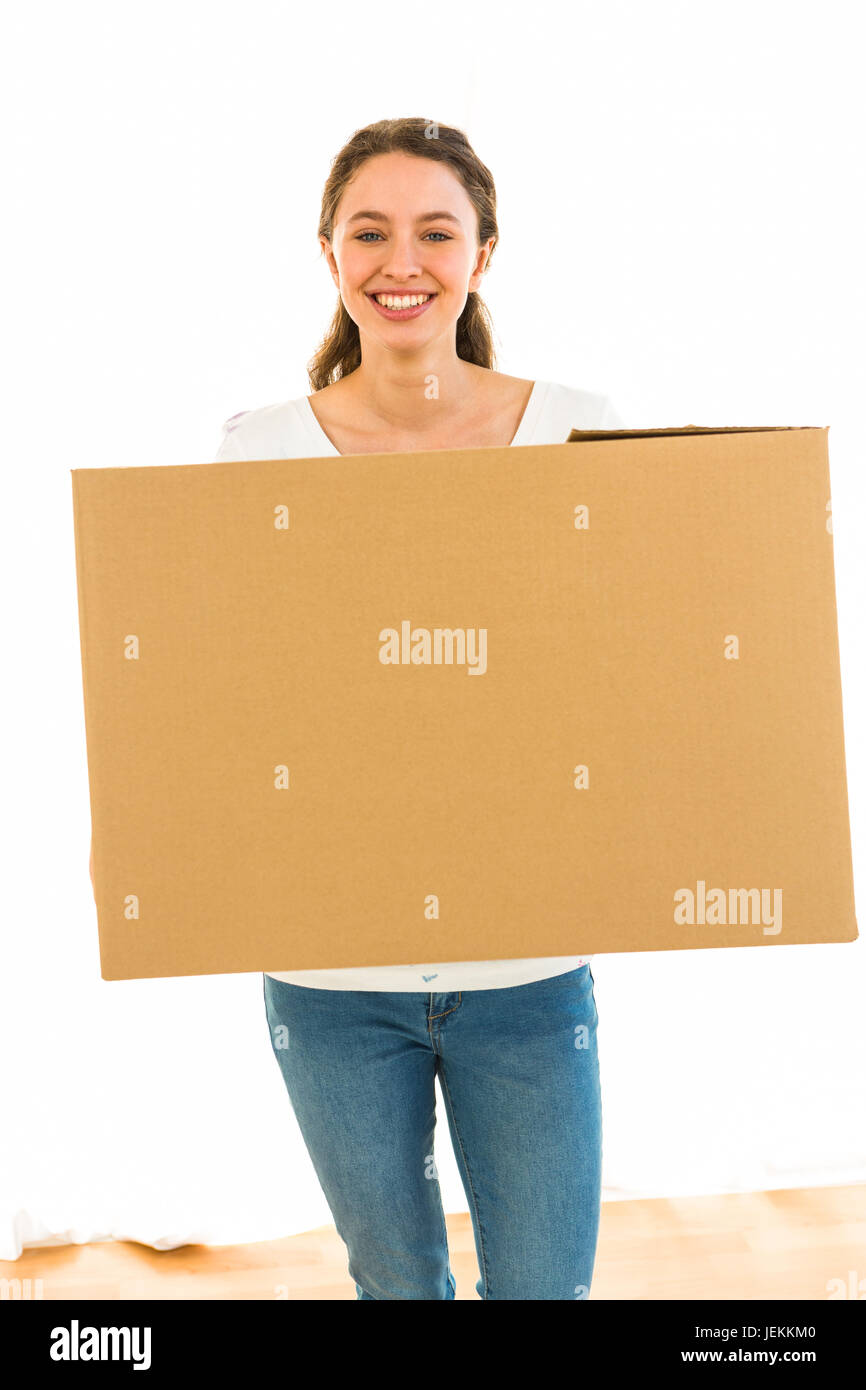 girl holding a box Stock Photo - Alamy