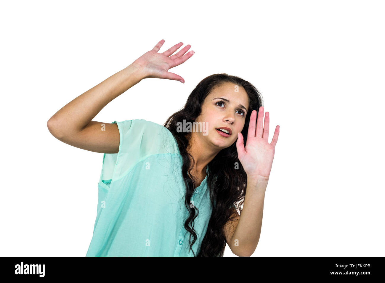 Scared woman raising hands Stock Photo - Alamy